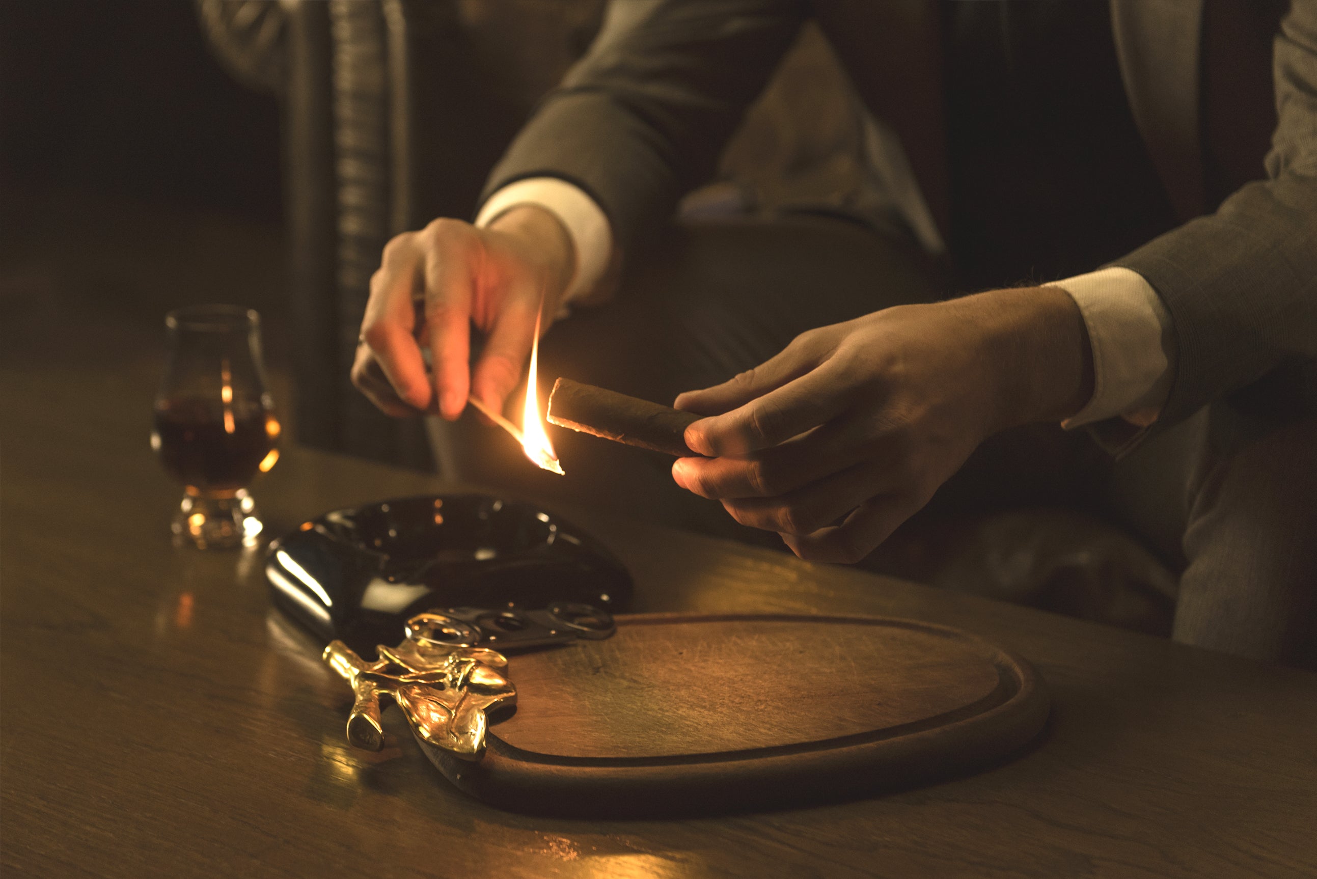 How to Properly Toast and Light a Cigar - Revolucion Lifestyles